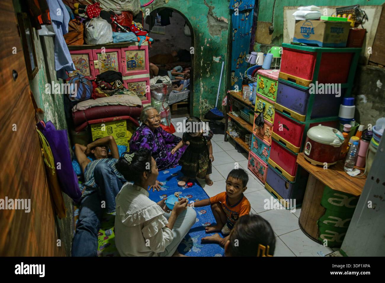 January 10, 2026, Jakarta, Java, Indonesia: A family rests inside their ...