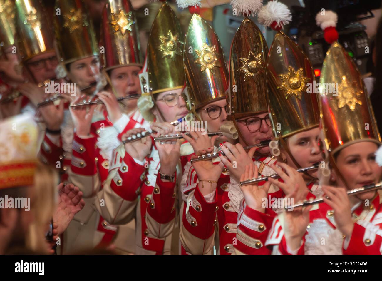 The members of Cologne carnival clubs march on the stage during the ...