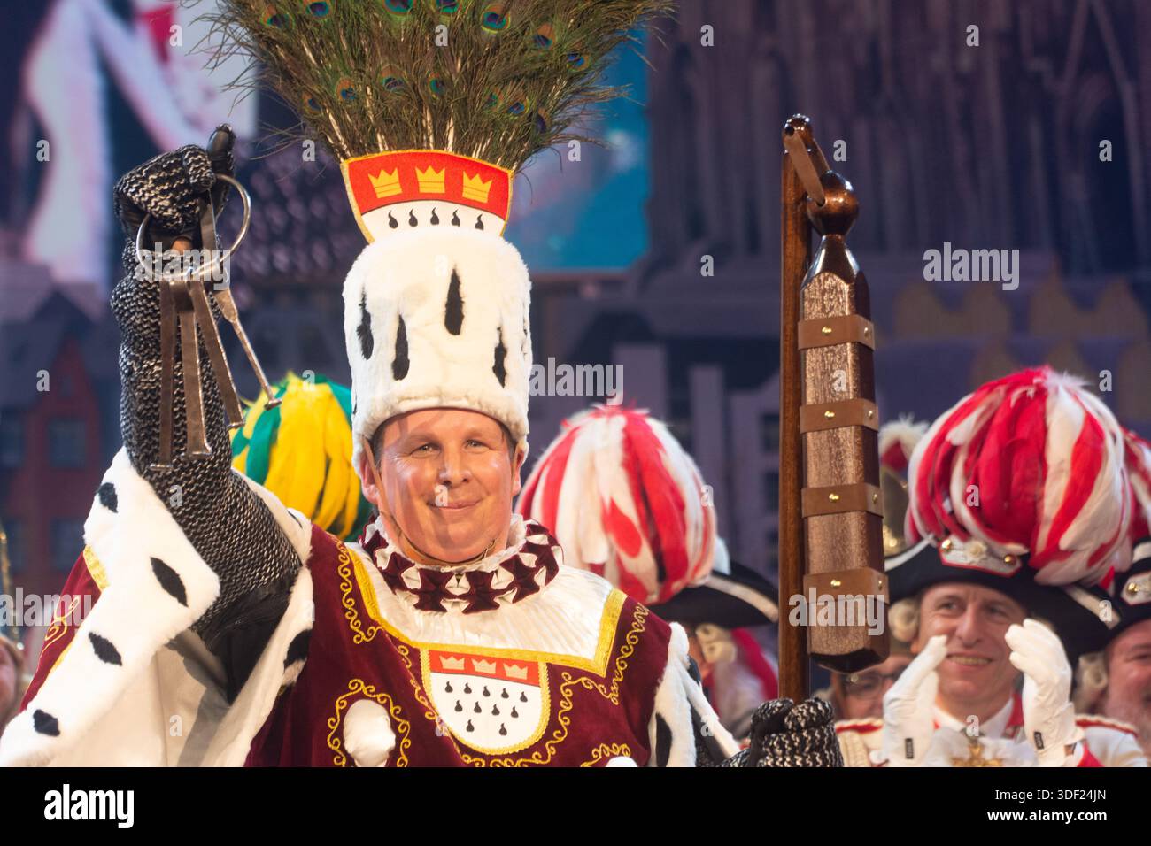 The Cologne Carnival Triumvirate greets the crowd on the stage during ...