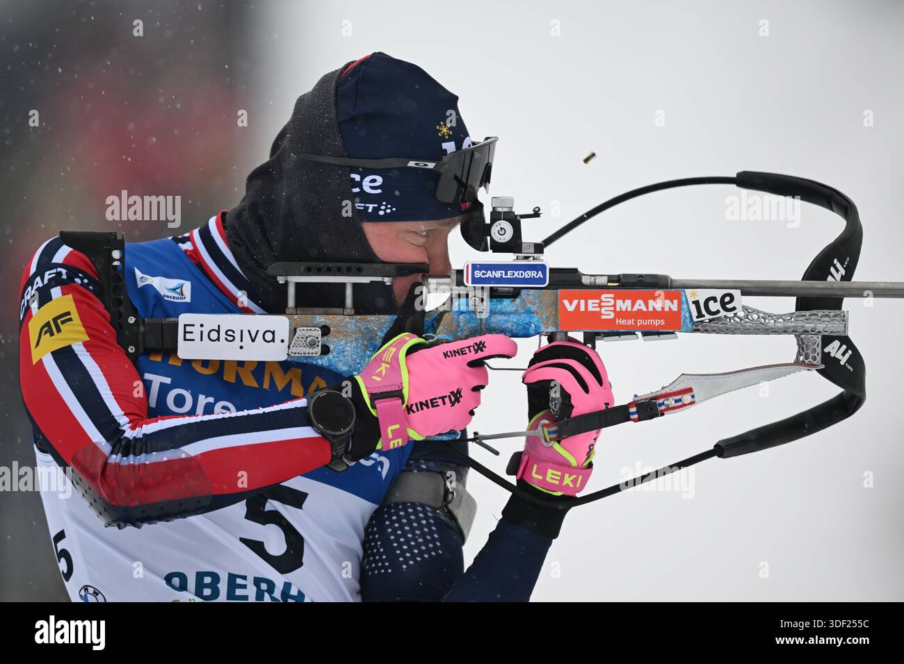 Martin Uldal from Norway competes at the shooting range during the 12.5 ...