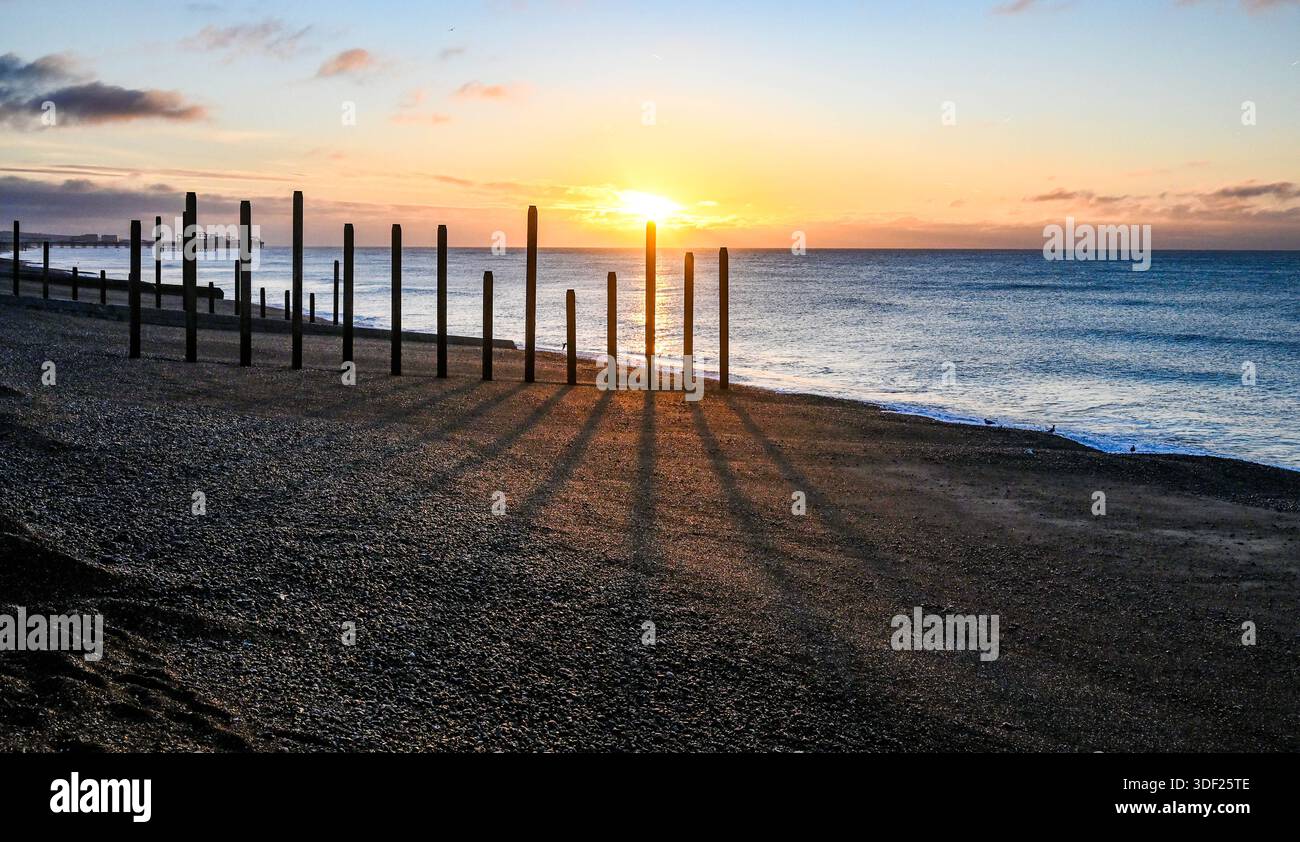 Brighton UK 10th January 2026 - New timber groynes are being put up on ...