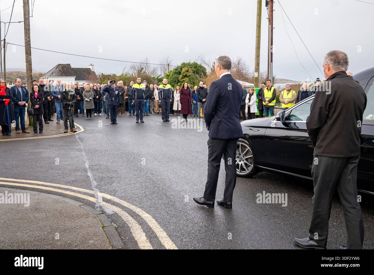 The coffin of Stephen McCahill arrives at the Church Of The Holy Family ...