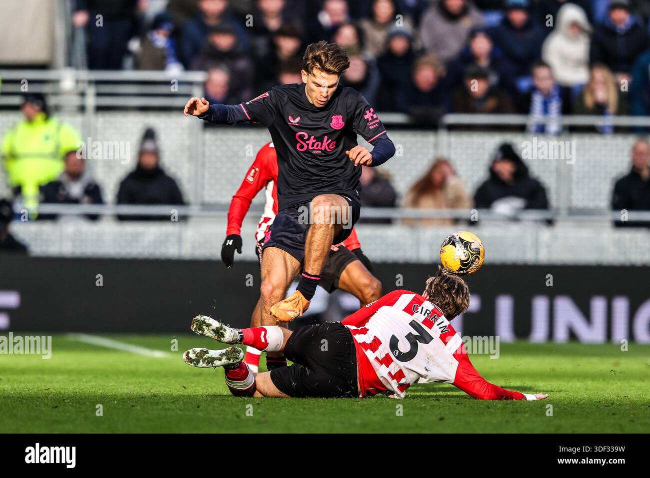 Tyler Dibling of Everton is tackled by Dennis Cirkin of Sunderland ...