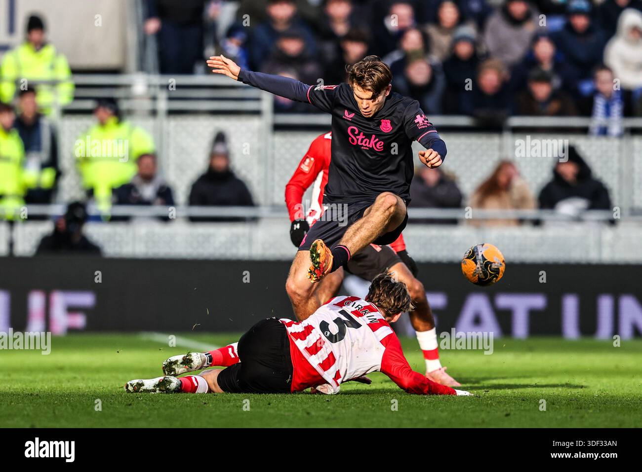 Tyler Dibling of Everton is tackled by Dennis Cirkin of Sunderland ...