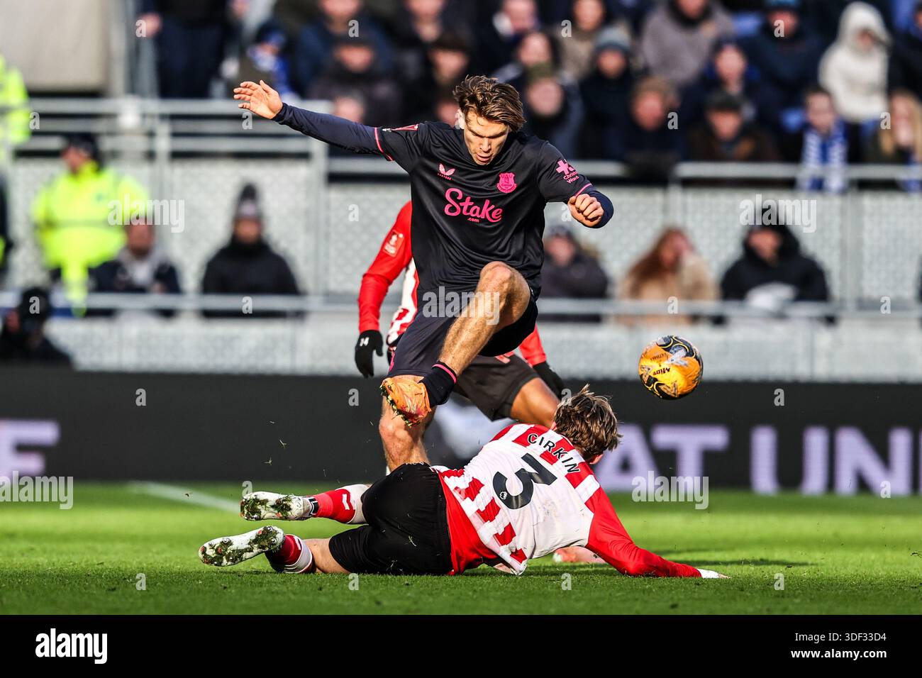 Tyler Dibling of Everton is tackled by Dennis Cirkin of Sunderland ...