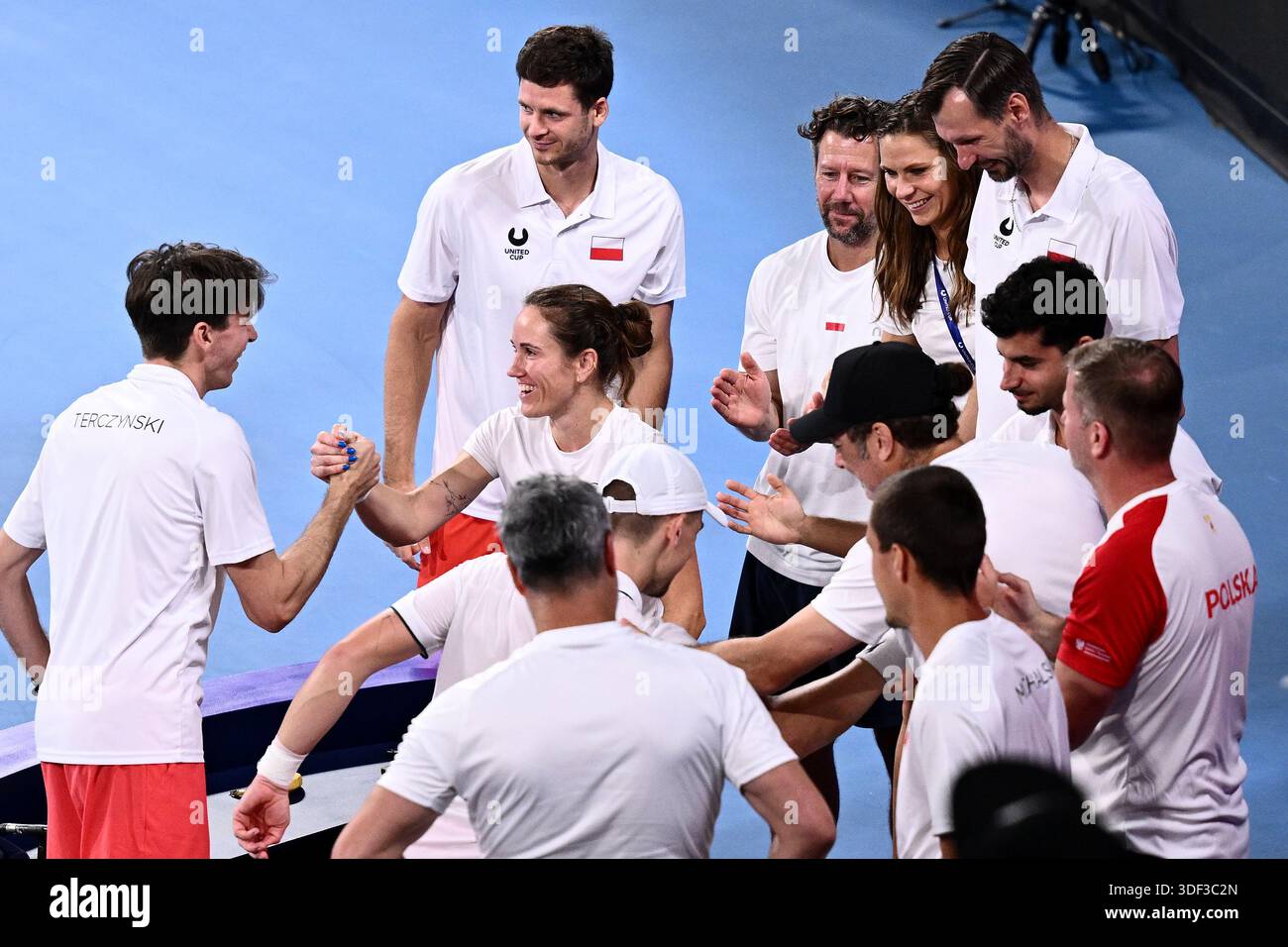 Team Poland captain Mateusz Terczynski (left) celebrates with Katarzyna ...