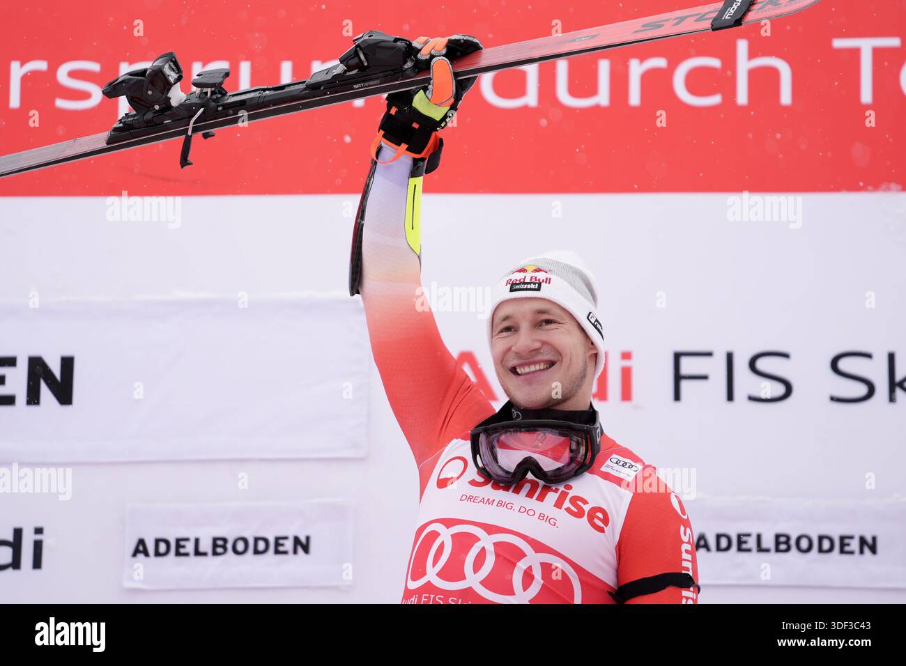 Switzerland's Marco Odermatt celebrates on the podium after winning an ...