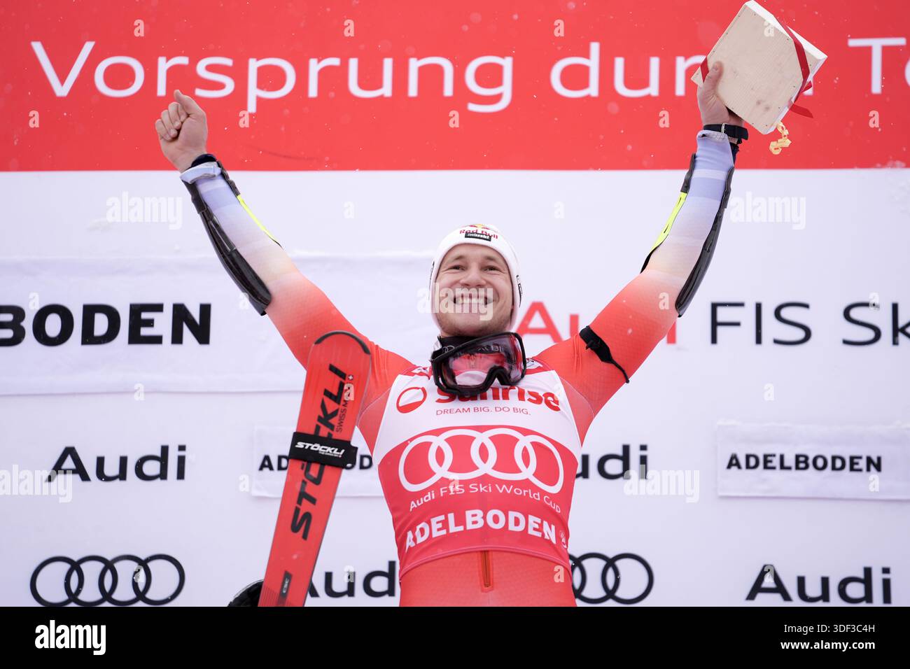 Switzerland's Marco Odermatt celebrates on the podium after winning an ...
