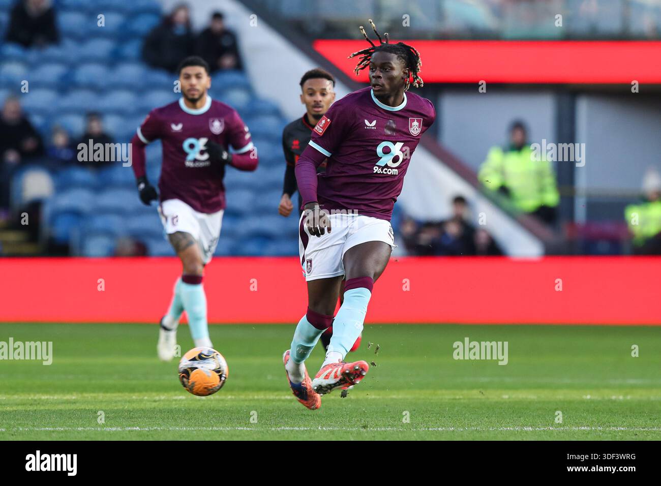 Lesley Ugochukwu of Burnley passes the ball forward during the Emirates ...