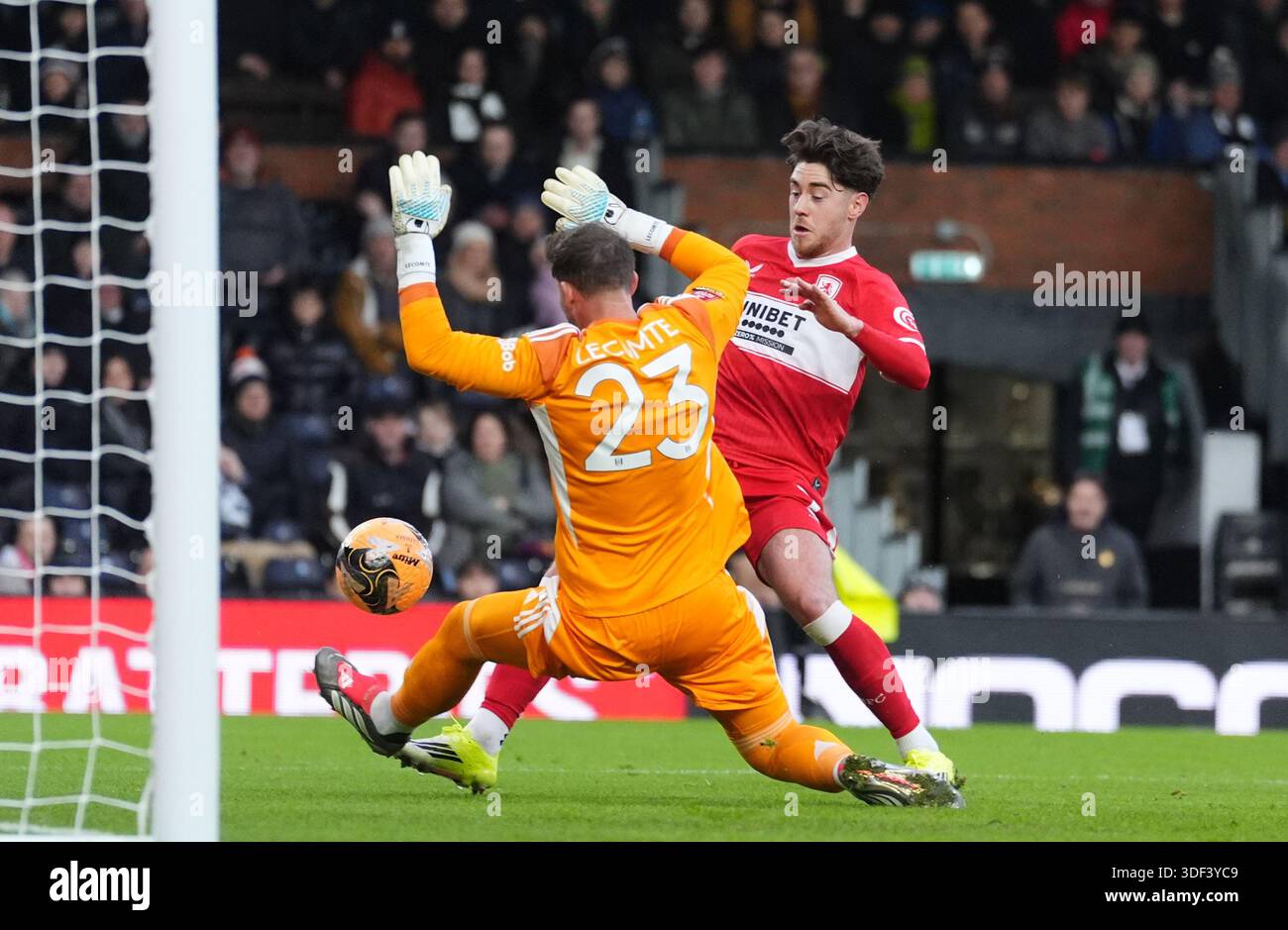 Middlesbrough's Hayden Hackney and Fulham goalkeeper Benjamin Lecomte ...