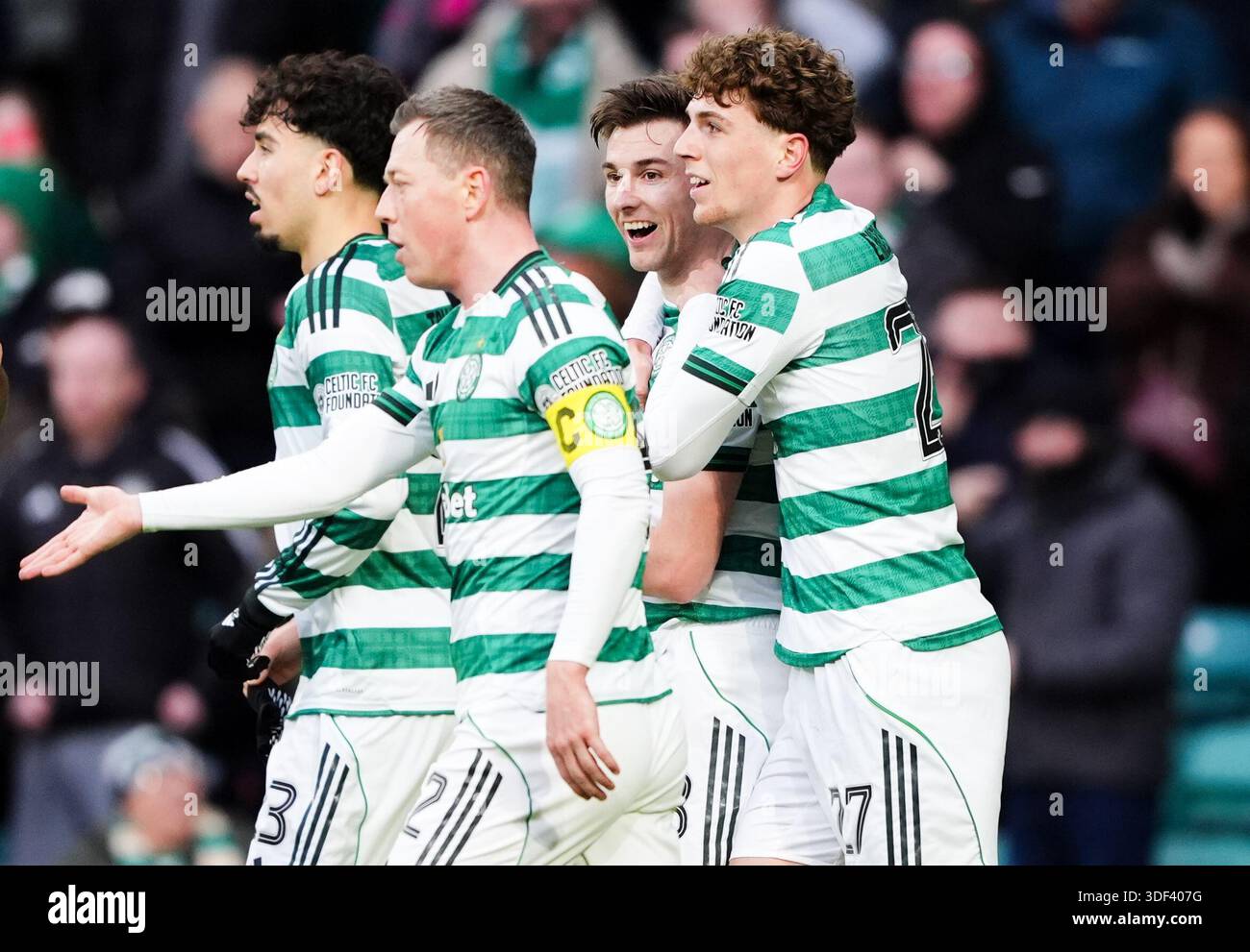 Celtic's Arne Engels (right) celebrates scoring his sides second goal ...