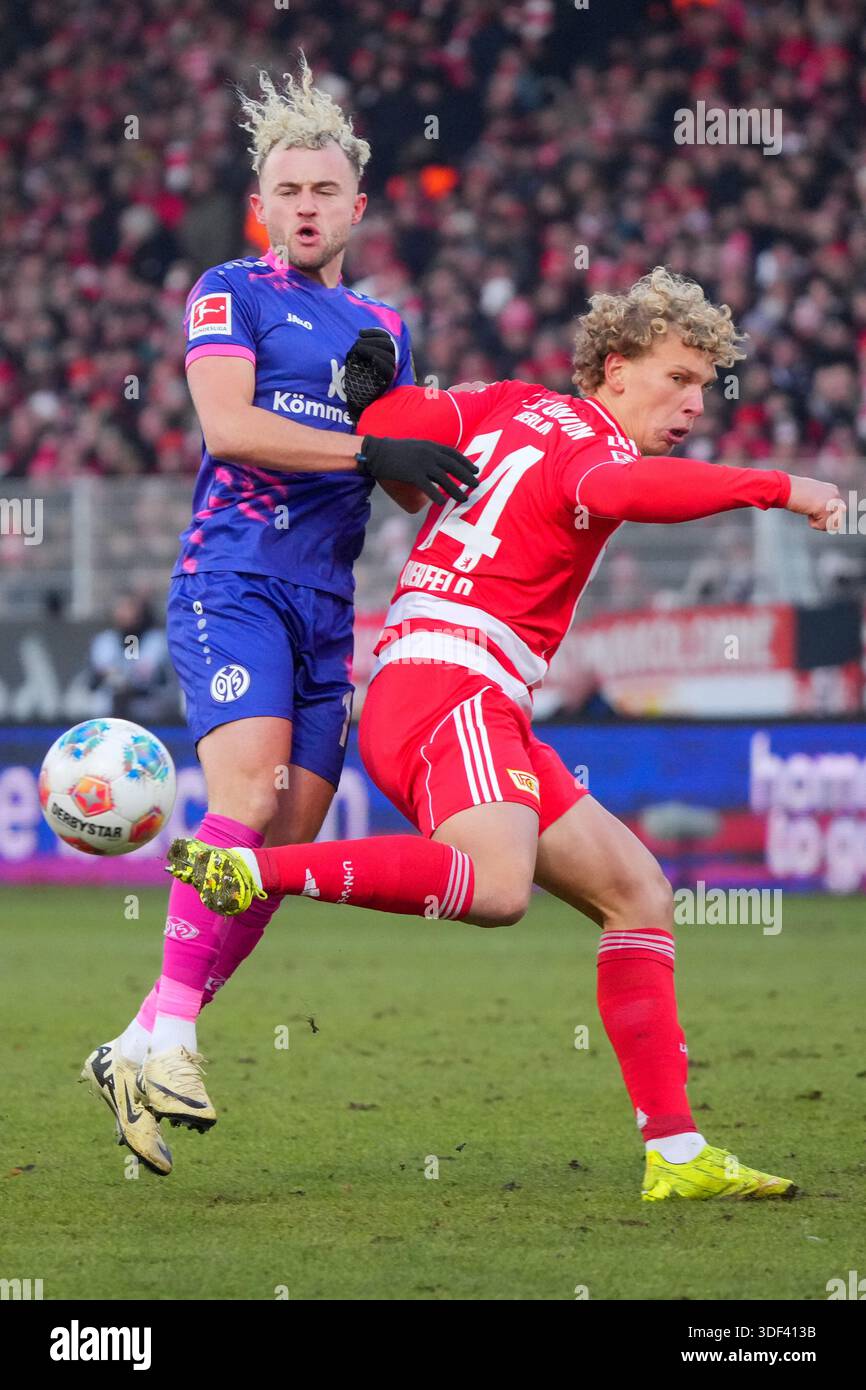 Mainz's Benedict Hollerbach, left, and Berlin's Leopold Querfeld in ...