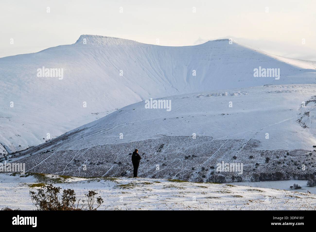 Brecon Beacons, Wales, UK. 10th January 2026. UK Weather. A walker ...