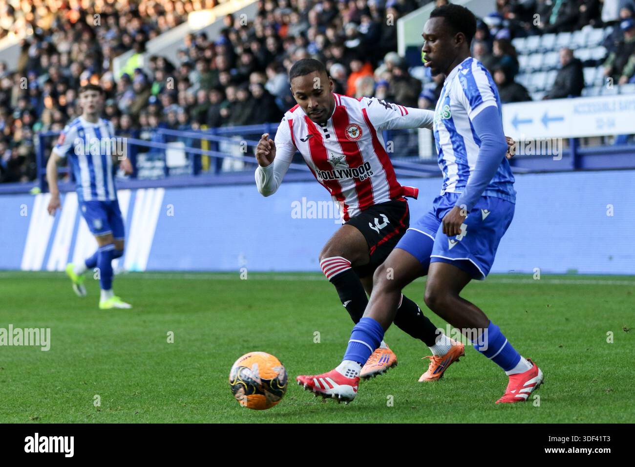 Rico Henry (3 Brentford) attempts for the ball during the FA Cup match ...