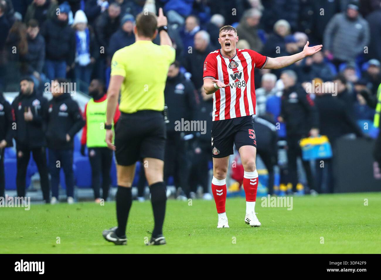 Dan Ballard of Sunderland talks to Referee, John Brooks during the ...