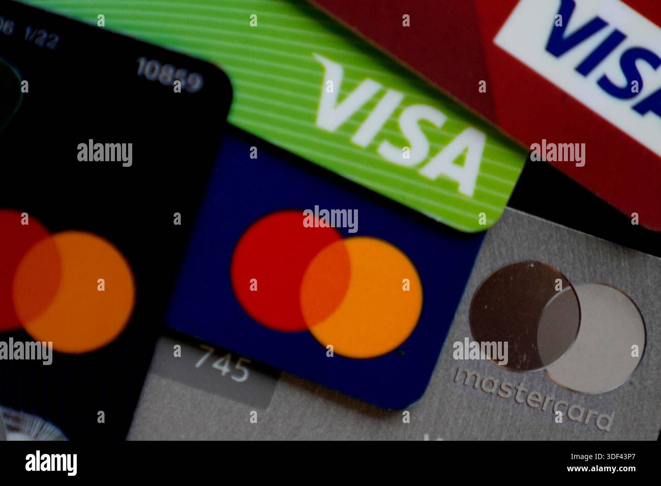 FILE - Visa and Mastercard credit cards are shown in Buffalo Grove, Ill ...