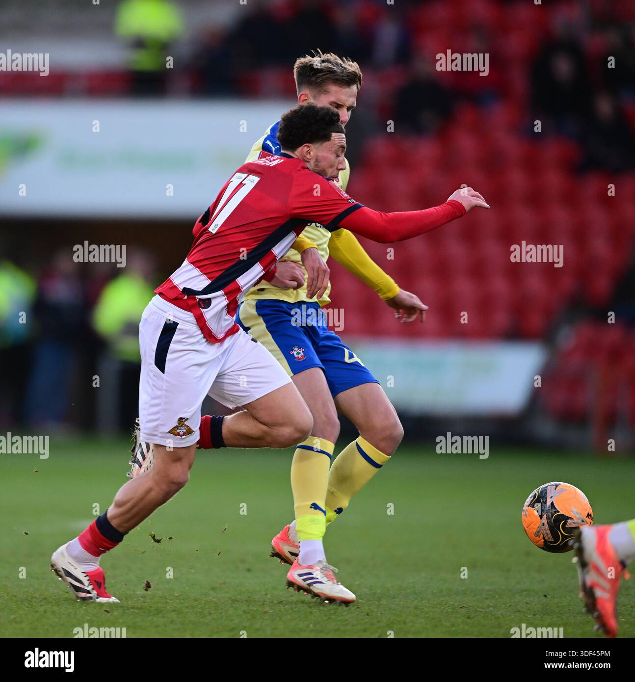Doncaster Rovers' Jordan Gibson battles for the ball against ...