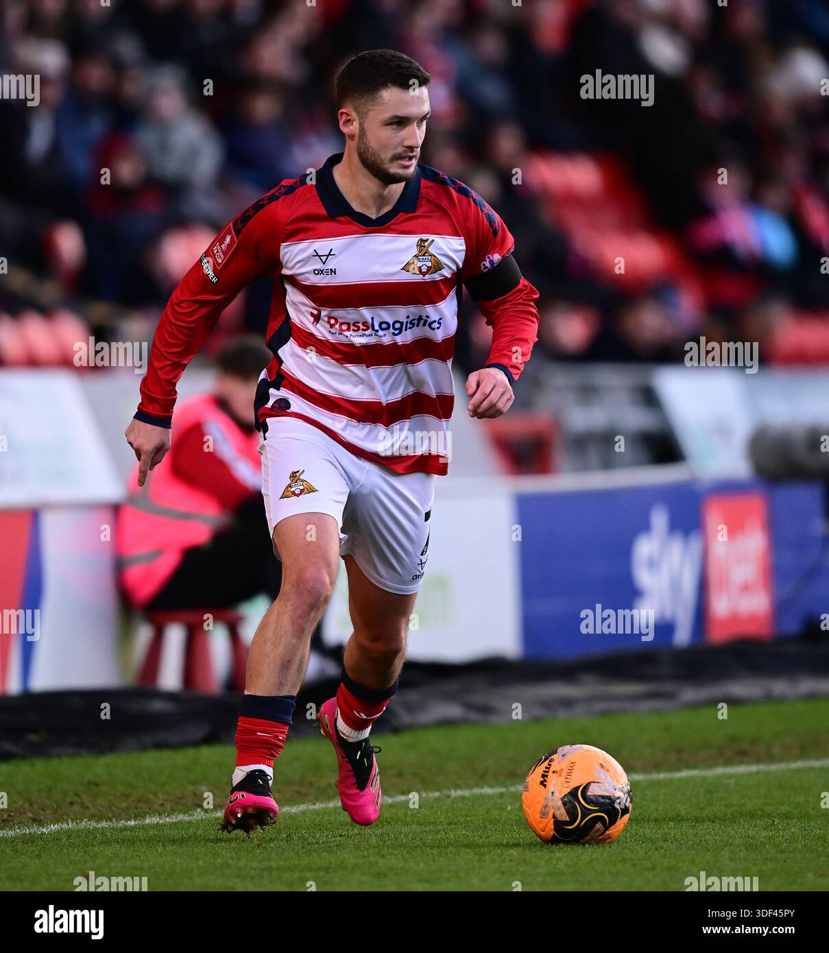 Doncaster Rovers' Luke Molyneux dribbles with the ball in the match ...