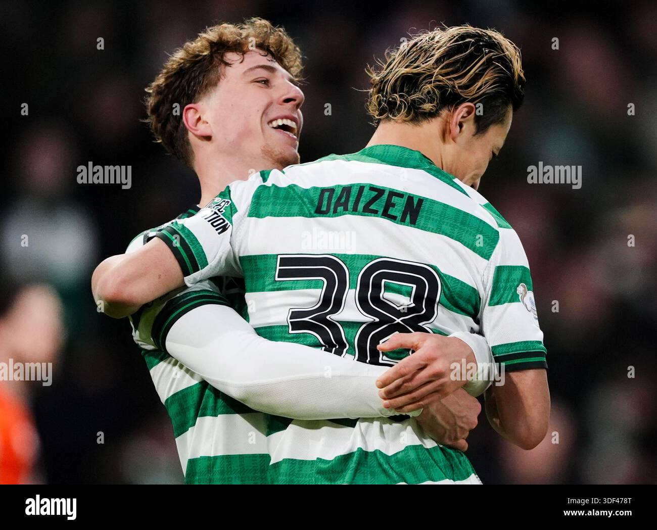 Celtic's Daizen Maeda celebrates scoring with Arne Engels during the ...