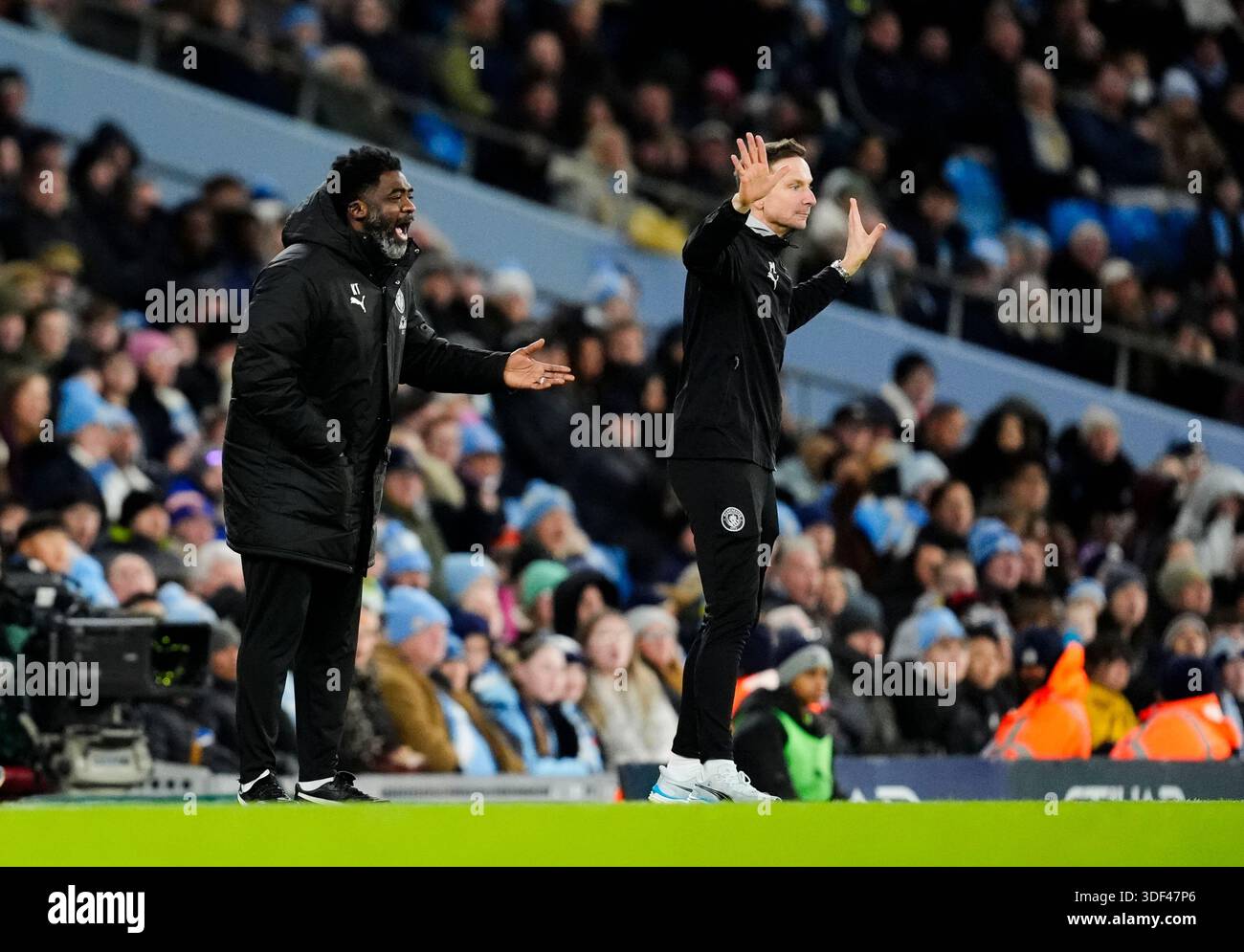 Manchester City coaches Pepijn Lijnders and Kolo Toure during the ...