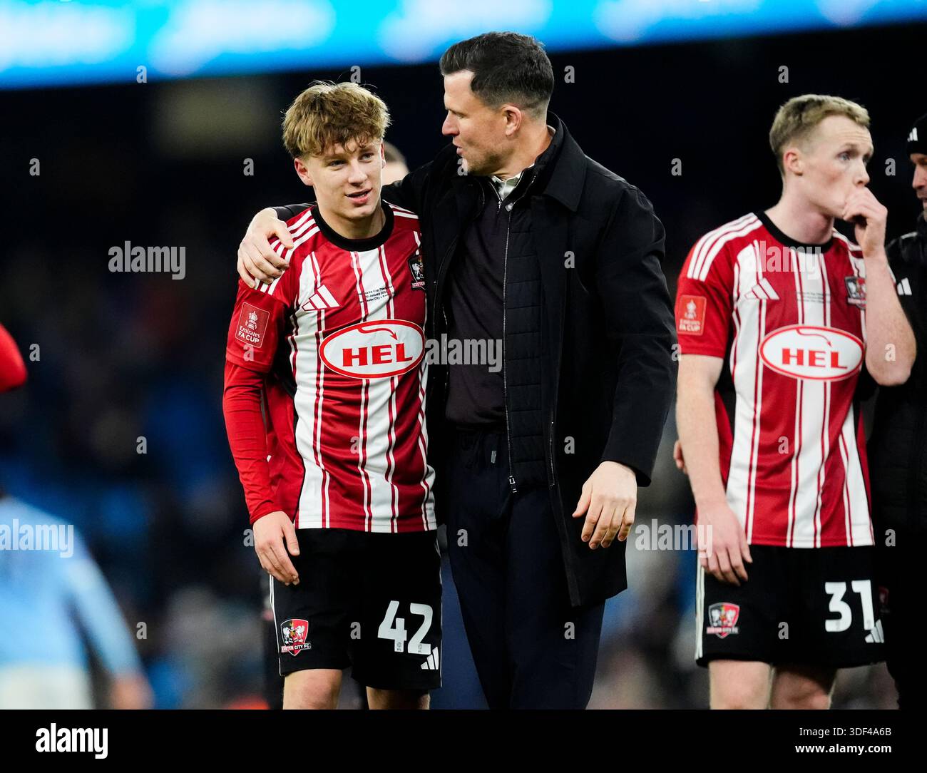 Exeter City's George Birch with manager Gary Caldwell following the ...