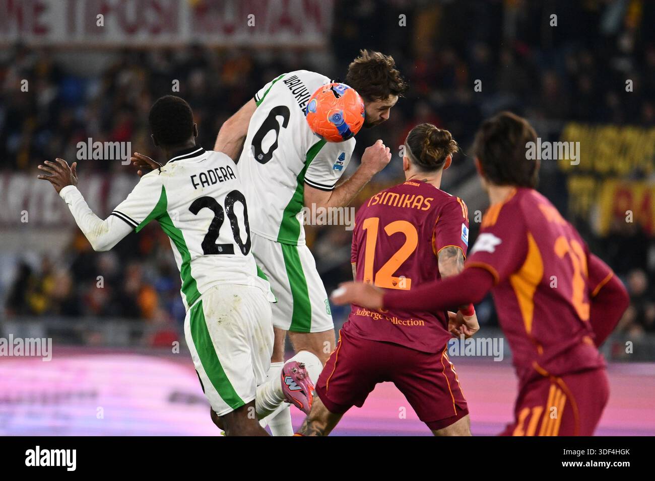 Sebastian Walukiewicz of U.S. Sassuolo and Kostas Tsimikas of A.S. Roma ...