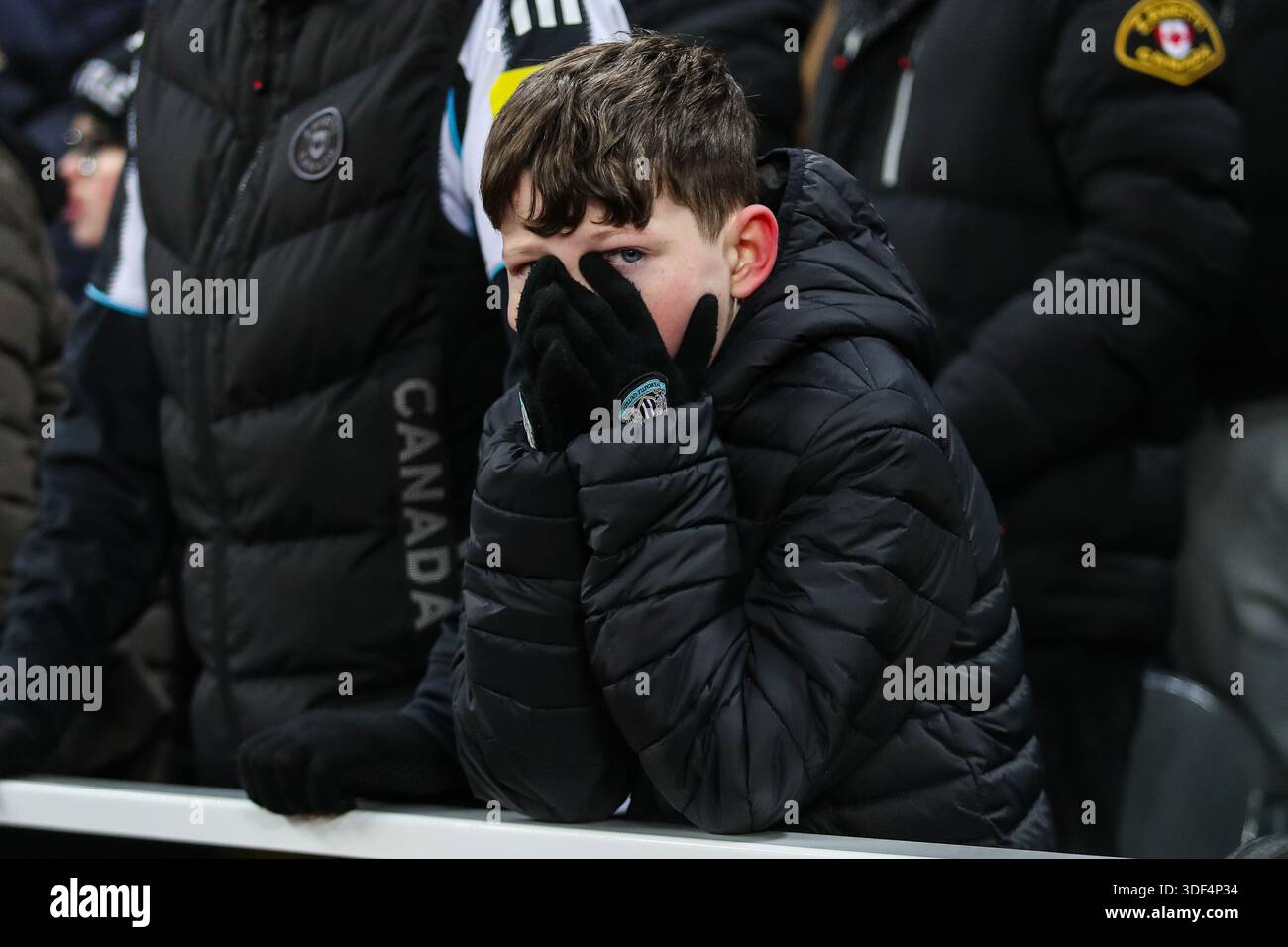 Newcastle Fan can’t watch during a penalty shootout during the ...