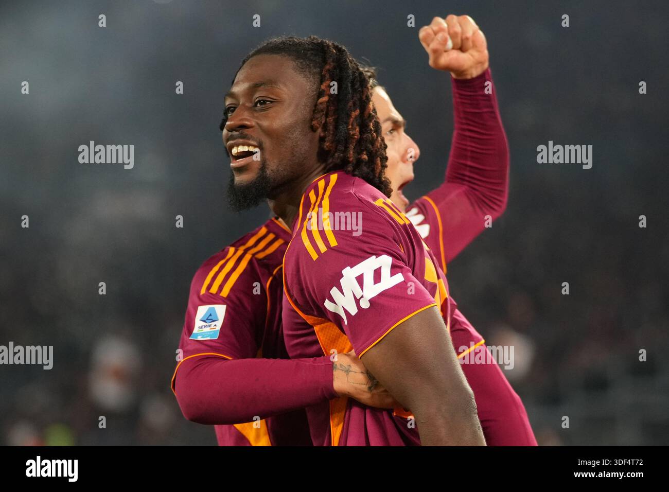 Roma's Manu Kone celebrates after scoring during a Serie A soccer match ...