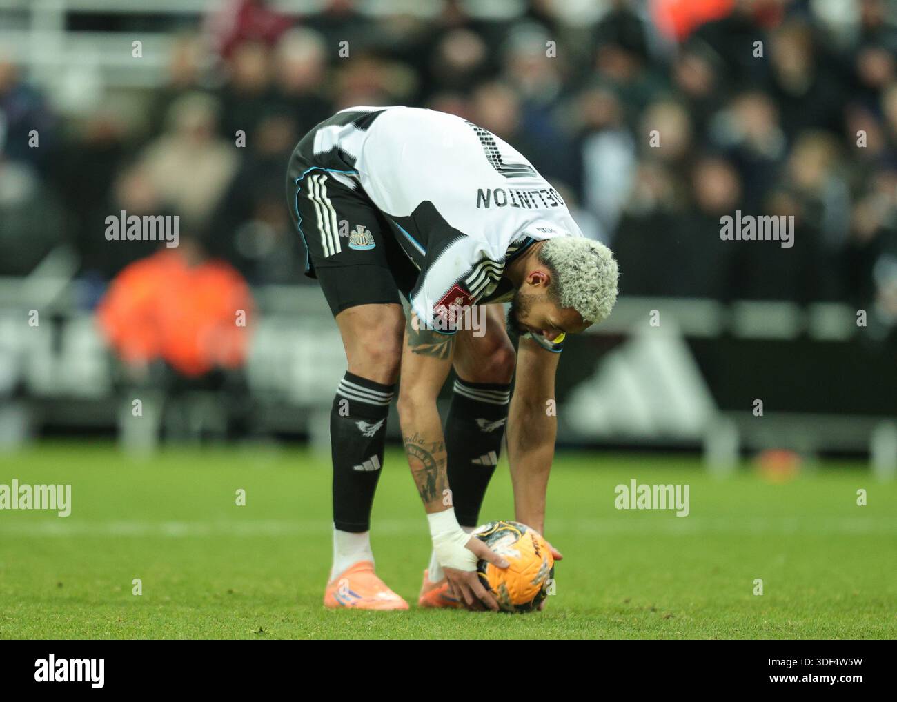 Joelinton of Newcastle United places ball on penalty spot during the ...