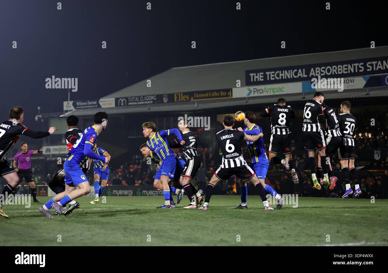 Weston-super-Mare's Luke Coulson (obscured) scores their side's first ...