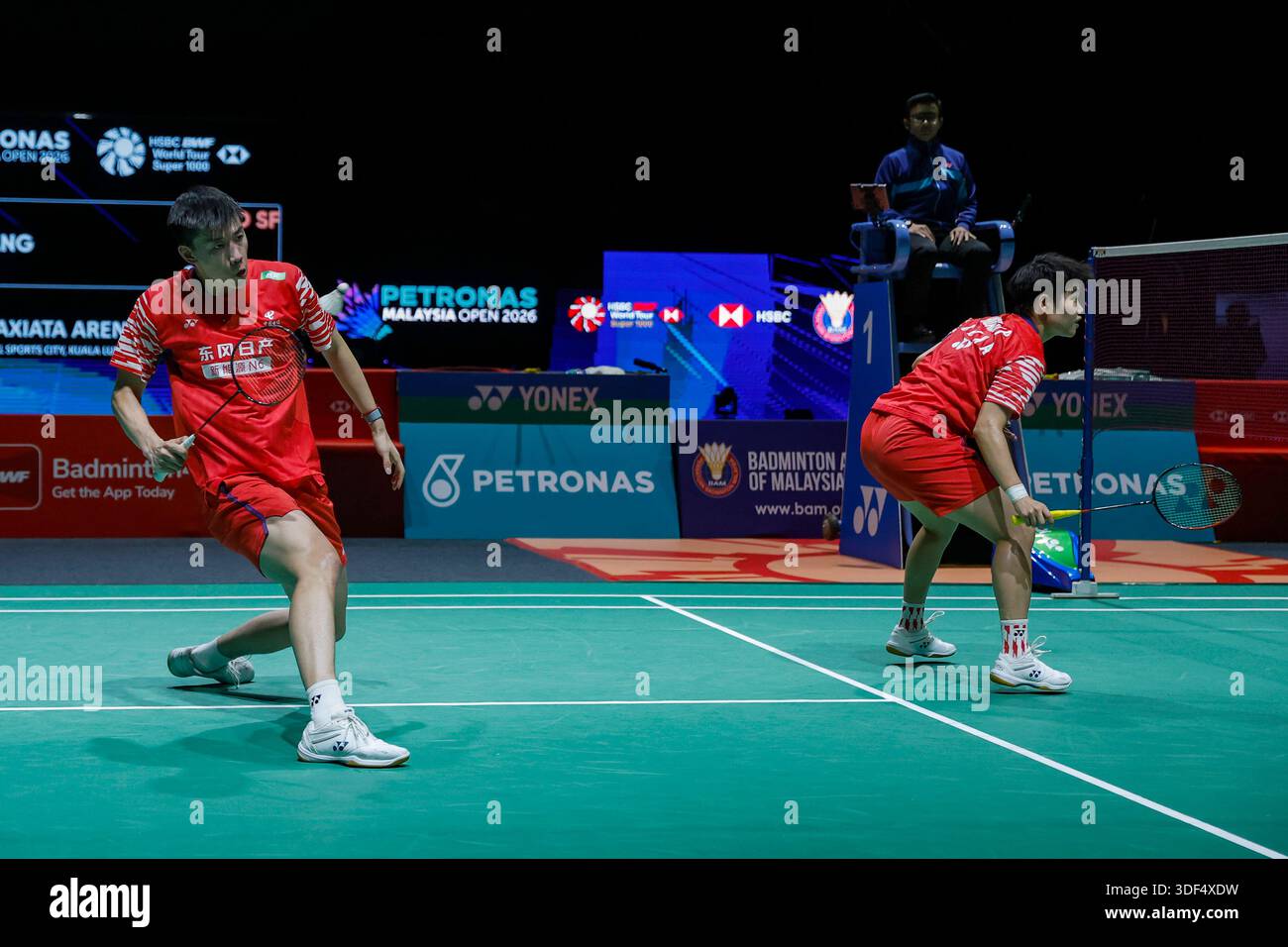 Feng Yan Zhe (L) and Huang Dong Ping of China plays against Tang Chun ...
