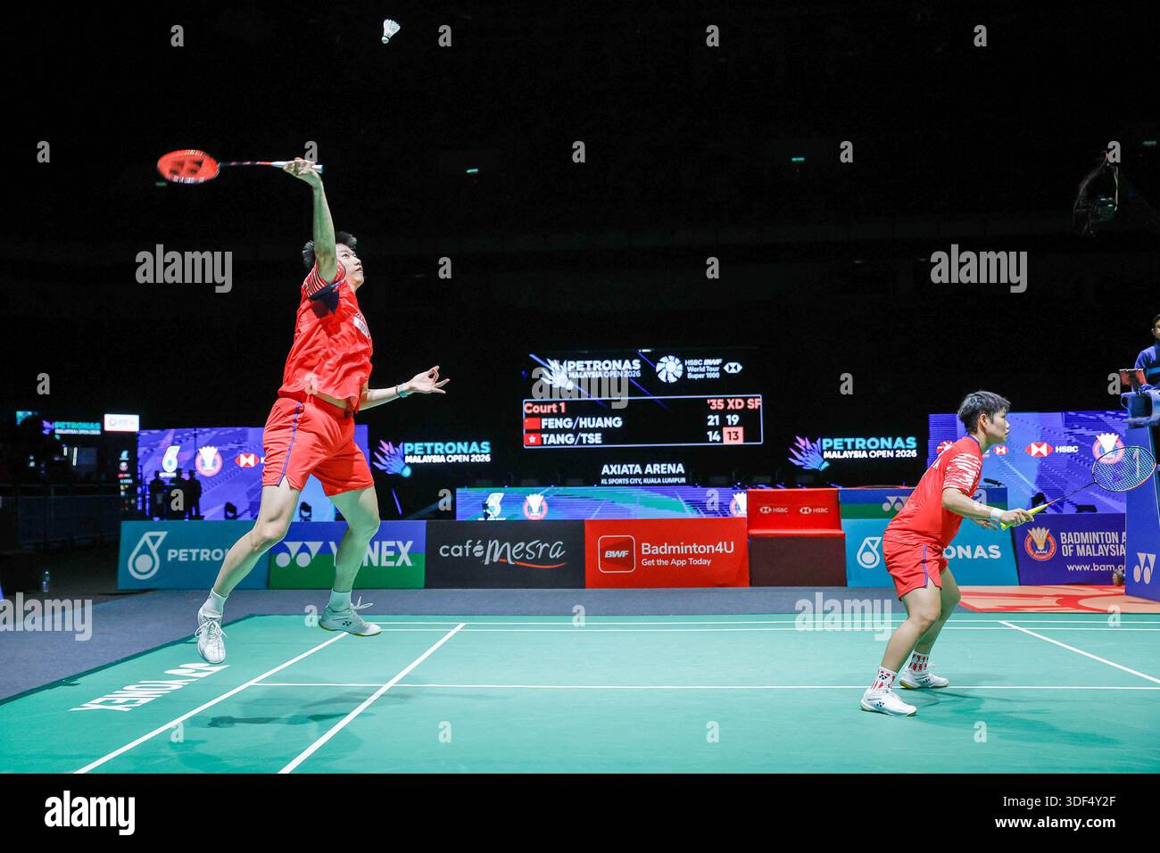 Feng Yan Zhe (L) and Huang Dong Ping of China plays against Tang Chun ...
