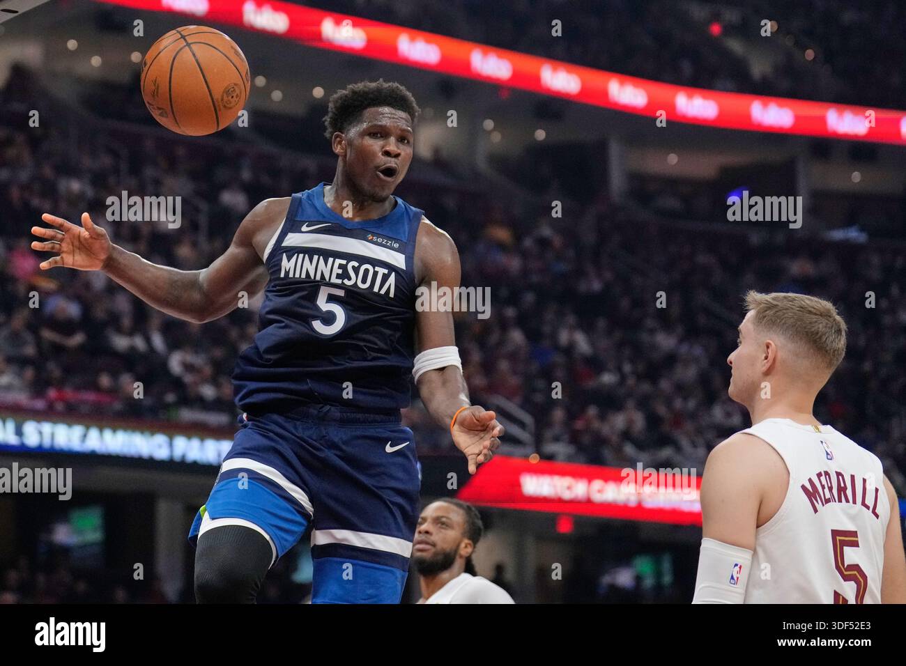 Minnesota Timberwolves guard Anthony Edwards (5) dunks in front of ...