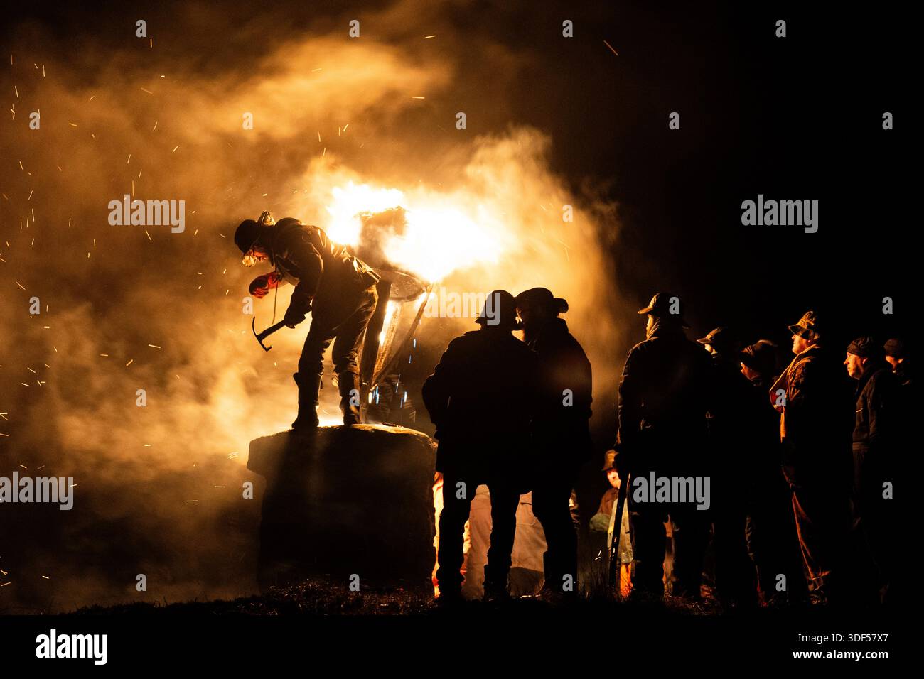 People take part in the Burning of the Clavie fire festival in Burghead ...