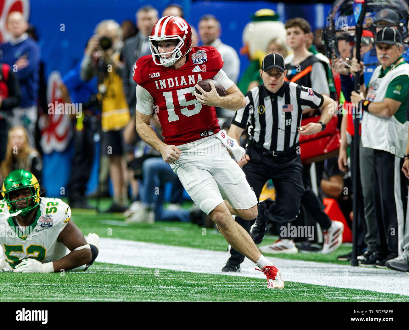 January 9, 2026: Indiana's Fernando Mendoza gets down the sideline ...