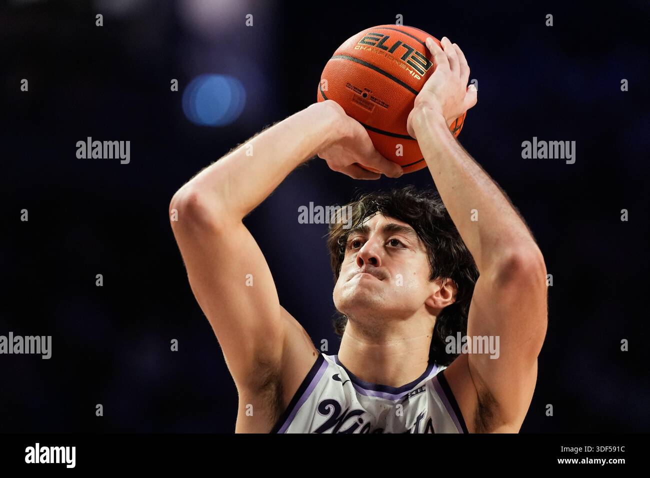 Kansas State center Dorin Buca shoots during the second half of an NCAA ...