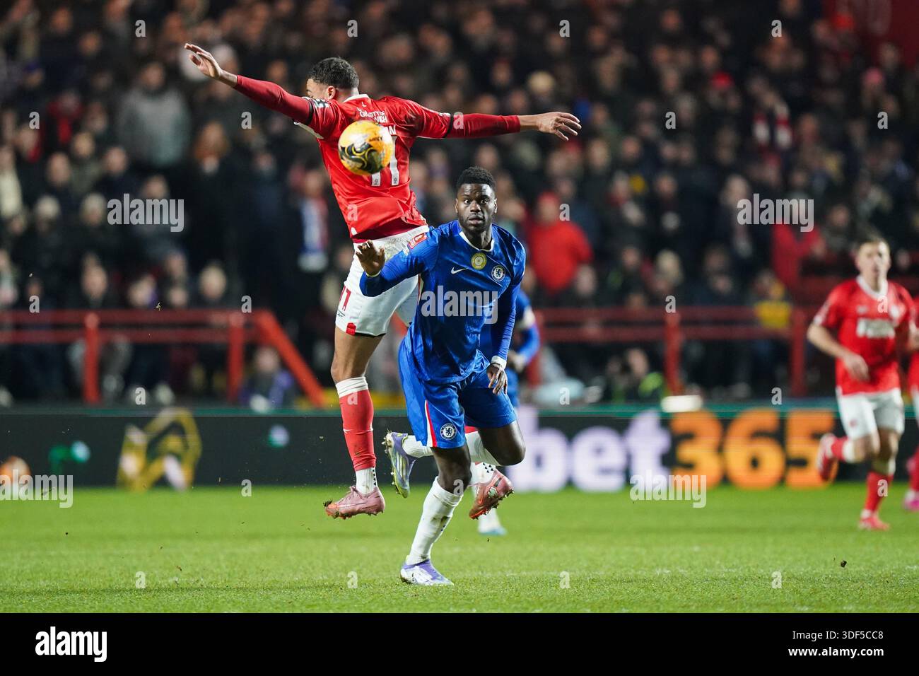 Miles Leaburn of Charlton Athletic and Benoît Badiashile of Chelsea ...