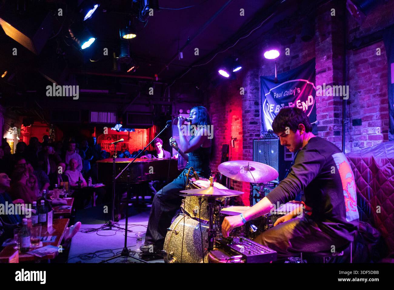 Celia Kameni performs with Dee Huang on guitar, Thibault Gomez on piano ...