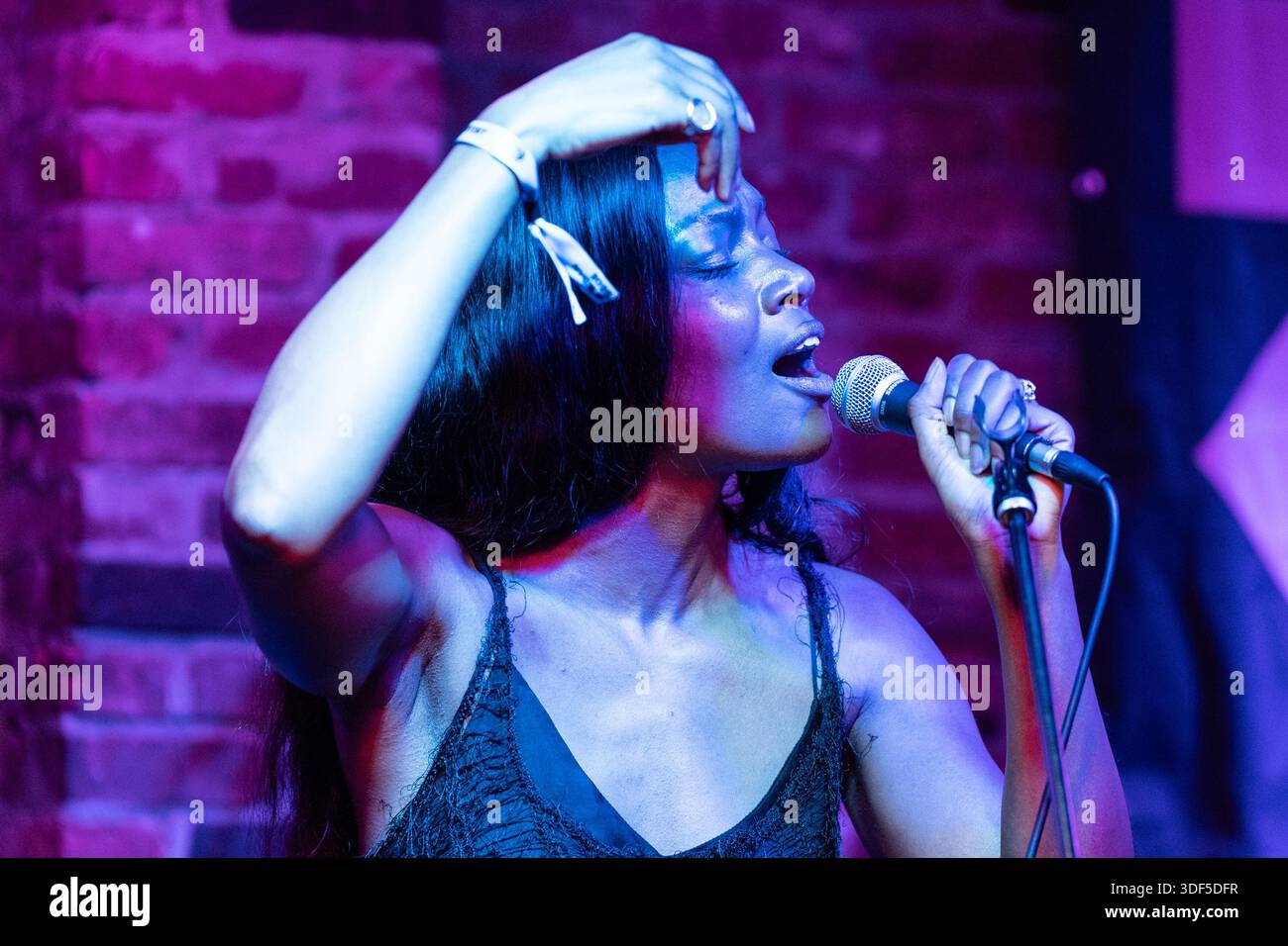 Celia Kameni performs with Dee Huang on guitar, Thibault Gomez on piano ...