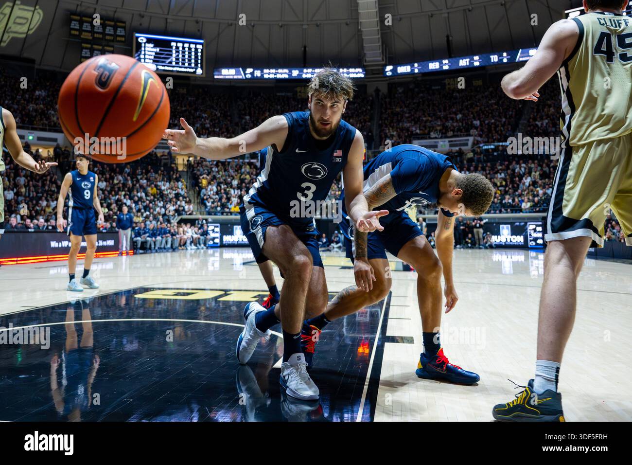 Penn State forward Ivan Juric (3) reaches for the ball as it flies out ...