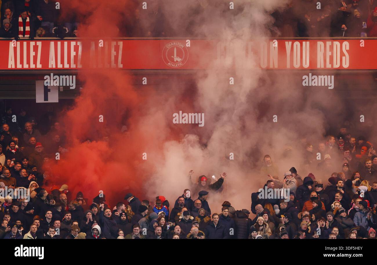 London, England, 10th January 2026. Charlton fans let off a smoke bomb ...