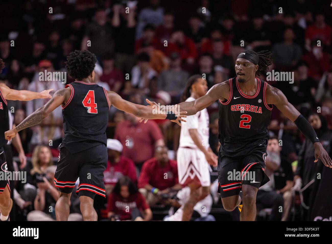 Georgia center Somto Cyril (2) celebrates with guard Marcus Millender ...