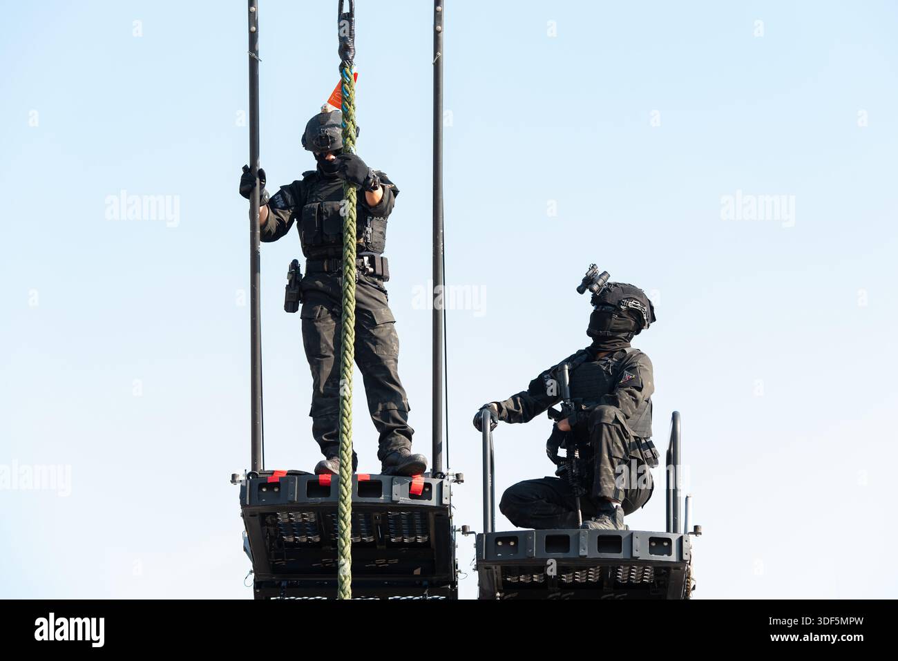 Special operations officers demonstrate during National Children's Day activities at Counter ...