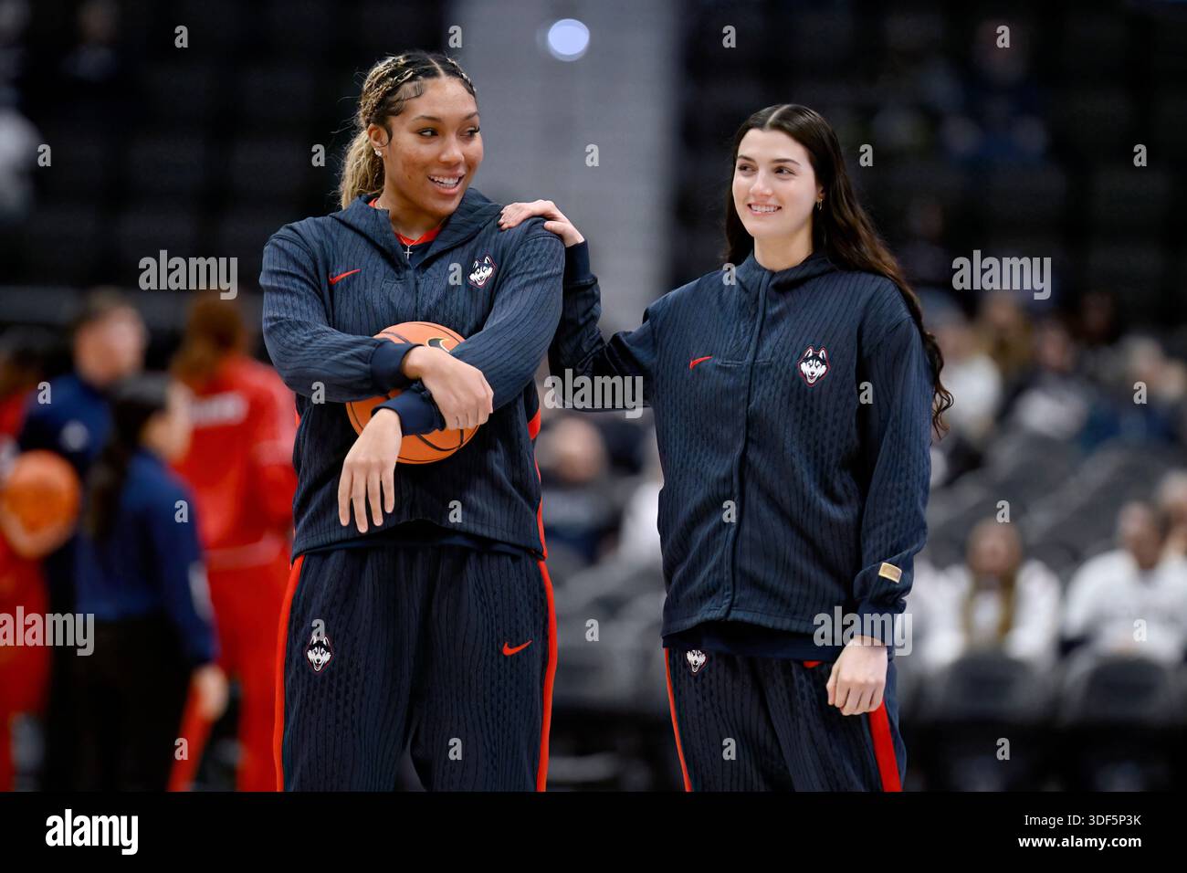 UConn's Ice Brady, left, and Morgan Cheli, right, during warm ups ...