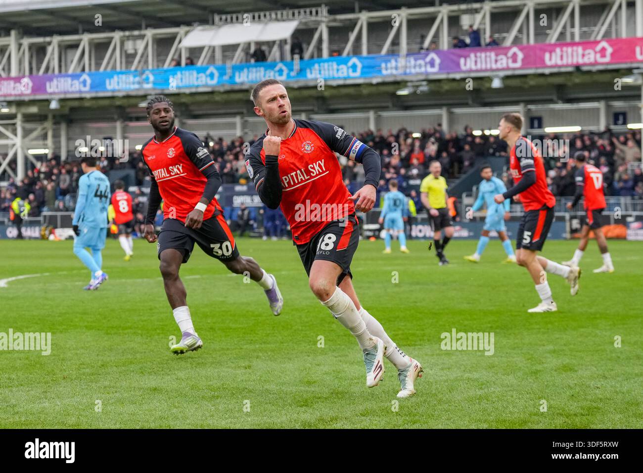 GOAL - Jordan Clark (18) of Luton Town celebrates after he scores his ...