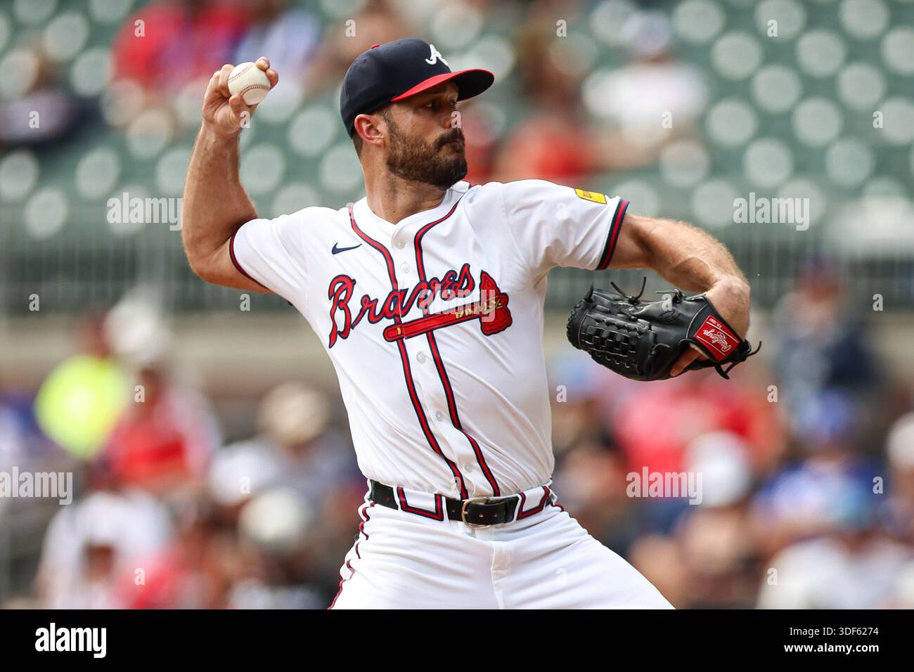 FILE - Atlanta Braves pitcher Tyler Kinley delivers in the eighth ...