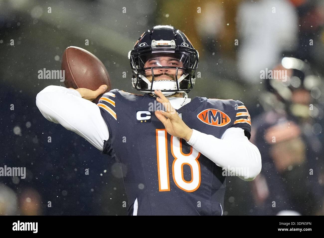 Chicago Bears' Caleb Williams warms up before an NFL wild-card playoff ...