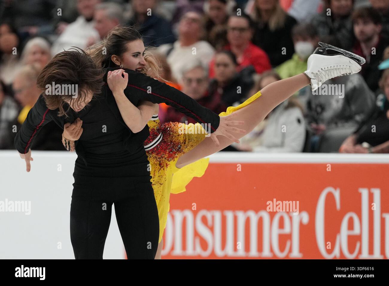 Katarina Wolfkostin and Dimitry Tsarevski skate during the free dance ...