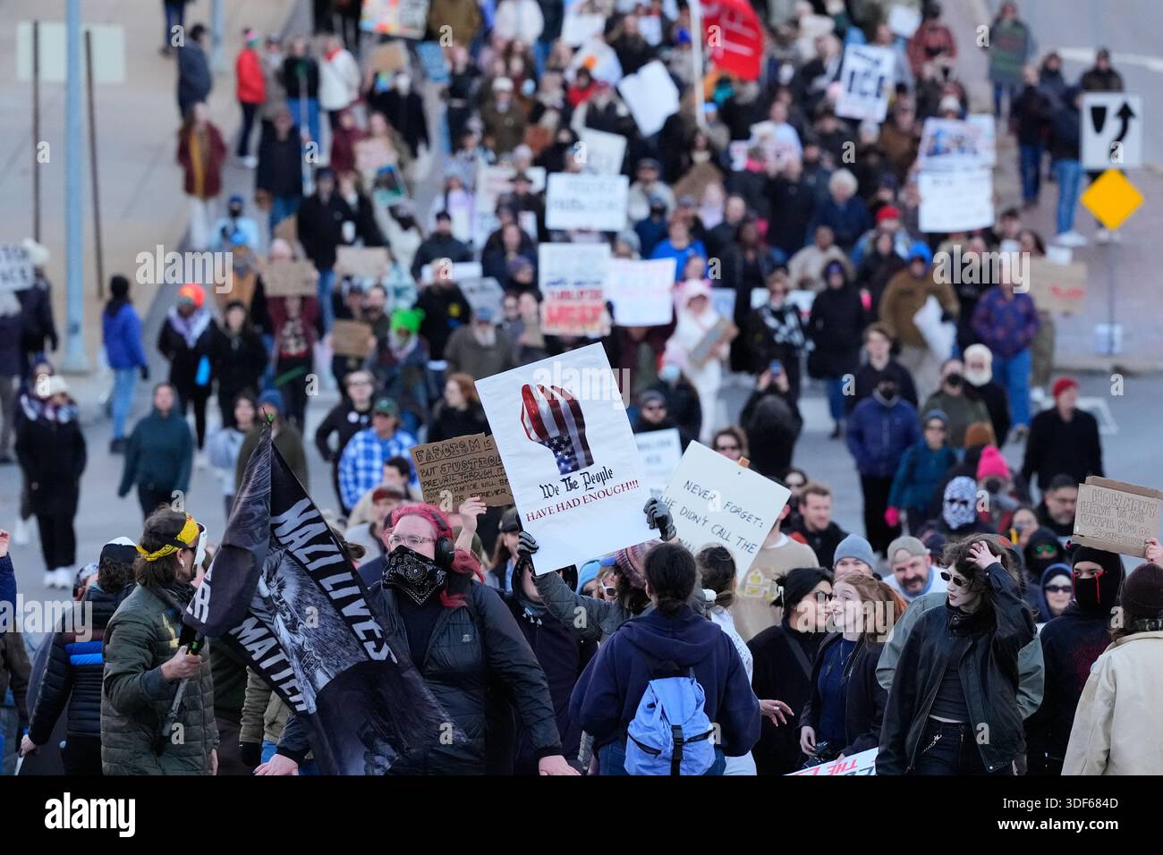 Protesters march during a rally for Renee Good, who was fatally shot by ...