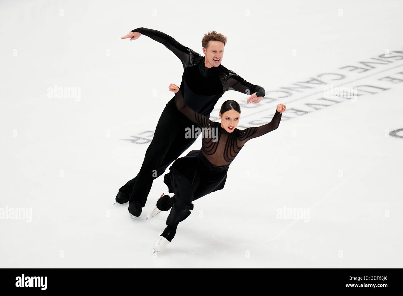 Madison Chock and Evan Bates skate during the free dance competition at ...